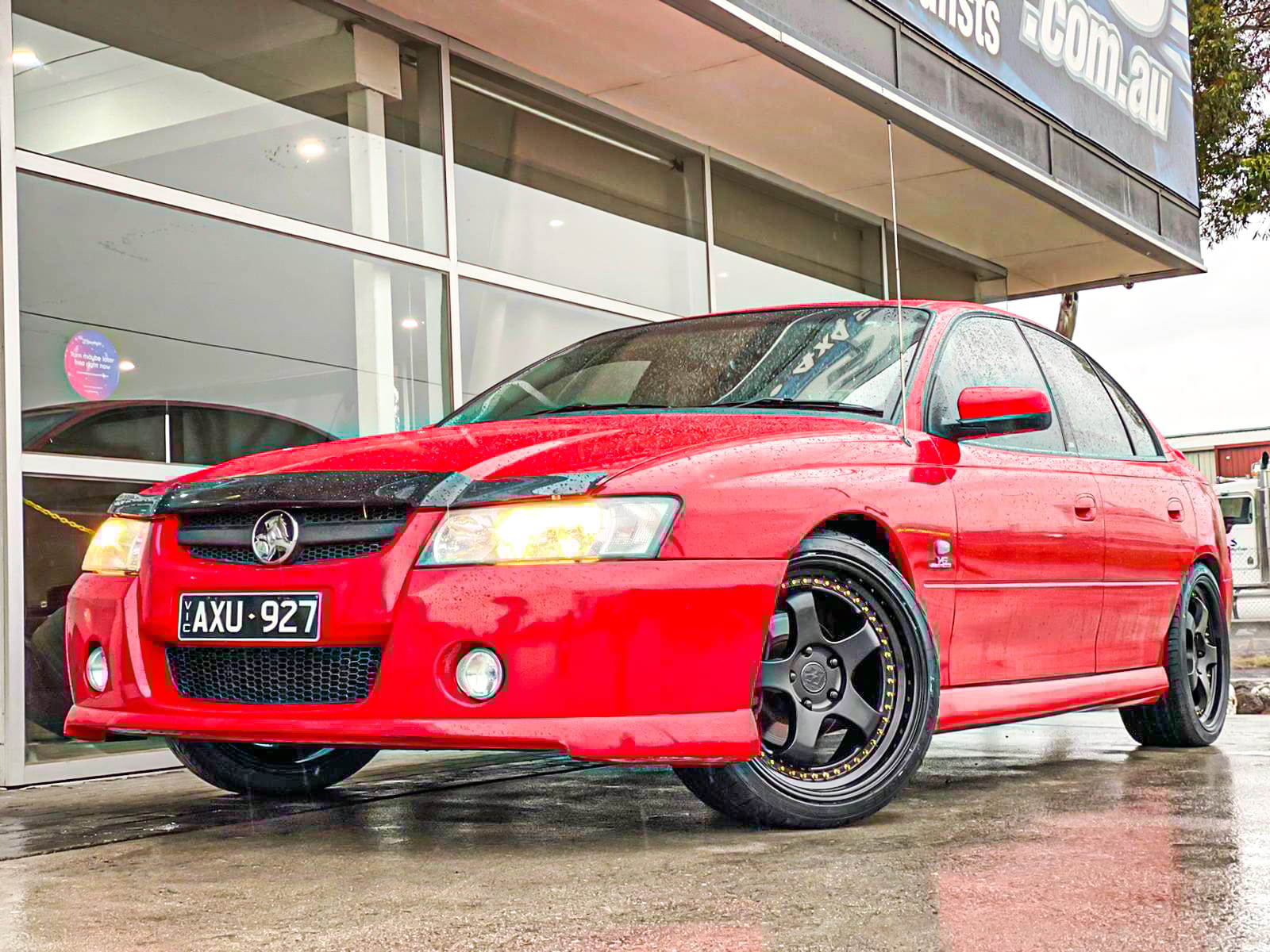 Holden commodore hussla zen matte black gold rivets gloss black lip #1080