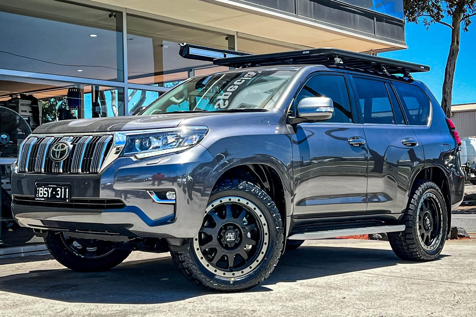 toyota land cruiser prado hussla raptor matte black dark tint lip black ...