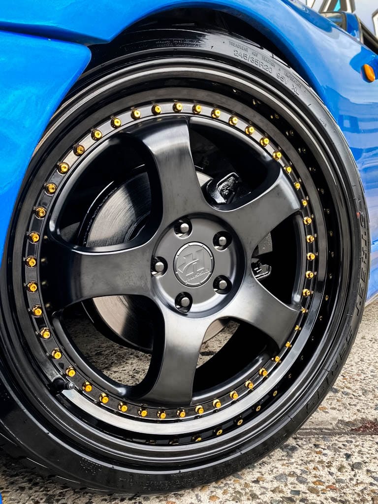 toyota supra hussla zen matte black gold rivets gloss black lip wheel ...