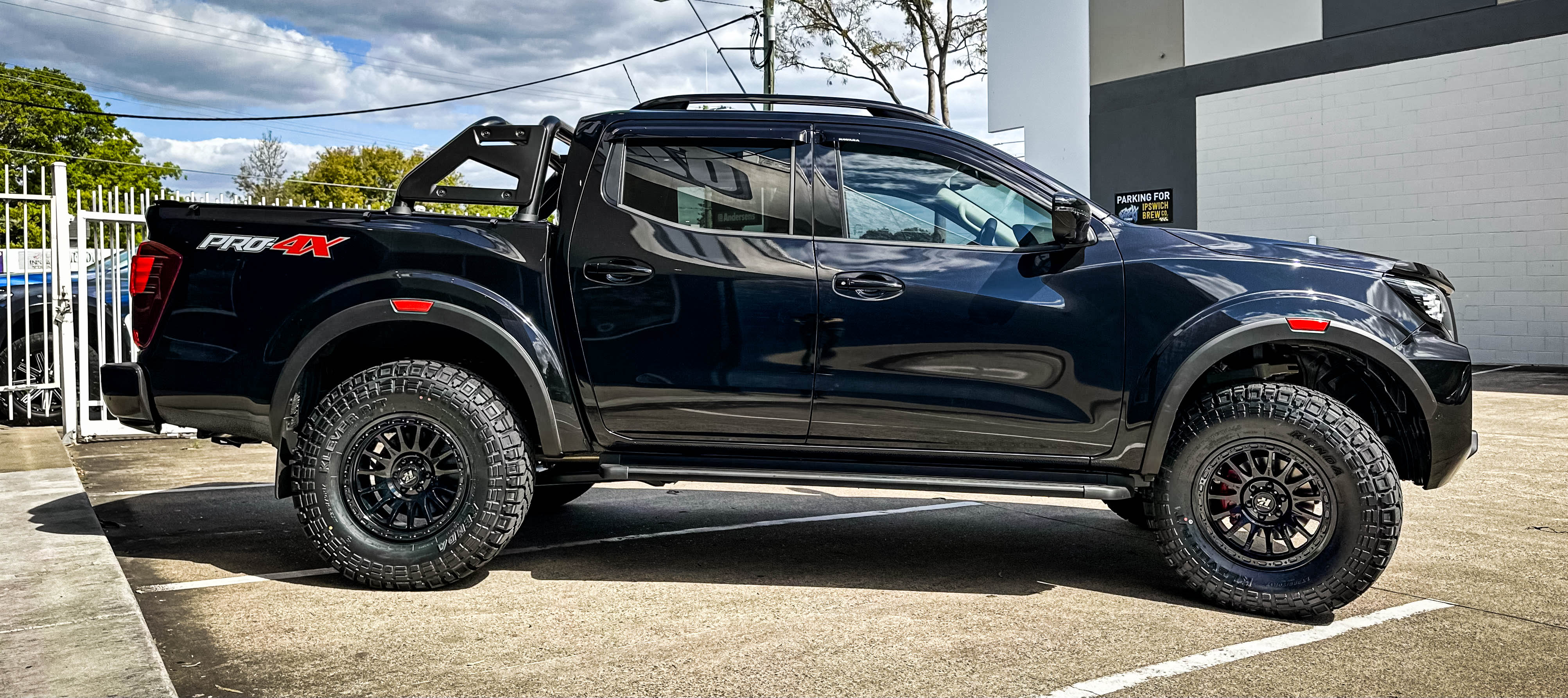 nissan navara hussla rugged race gloss black wheel #16600