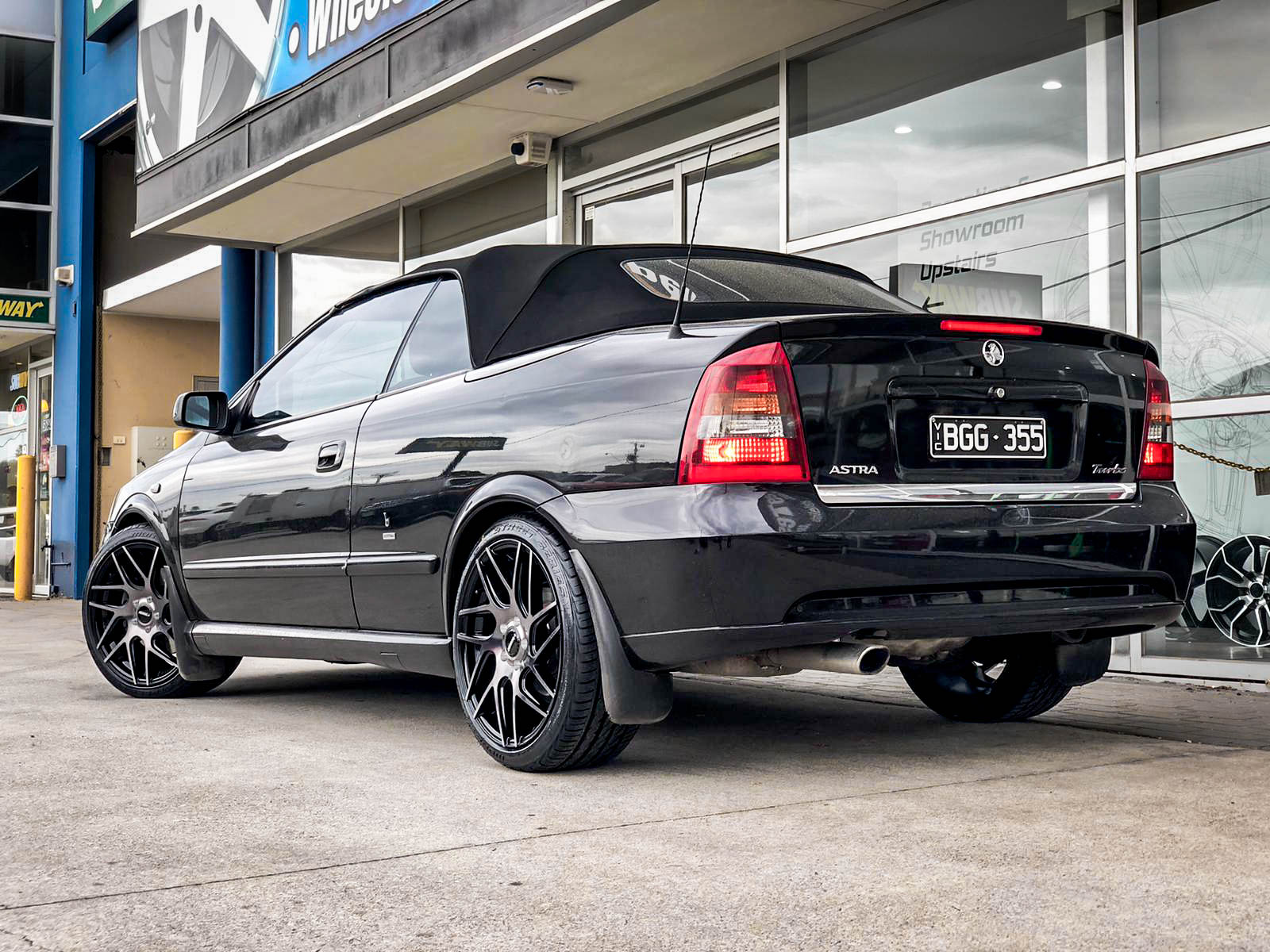 Holden astra hussla savage gloss black dark tint #2845