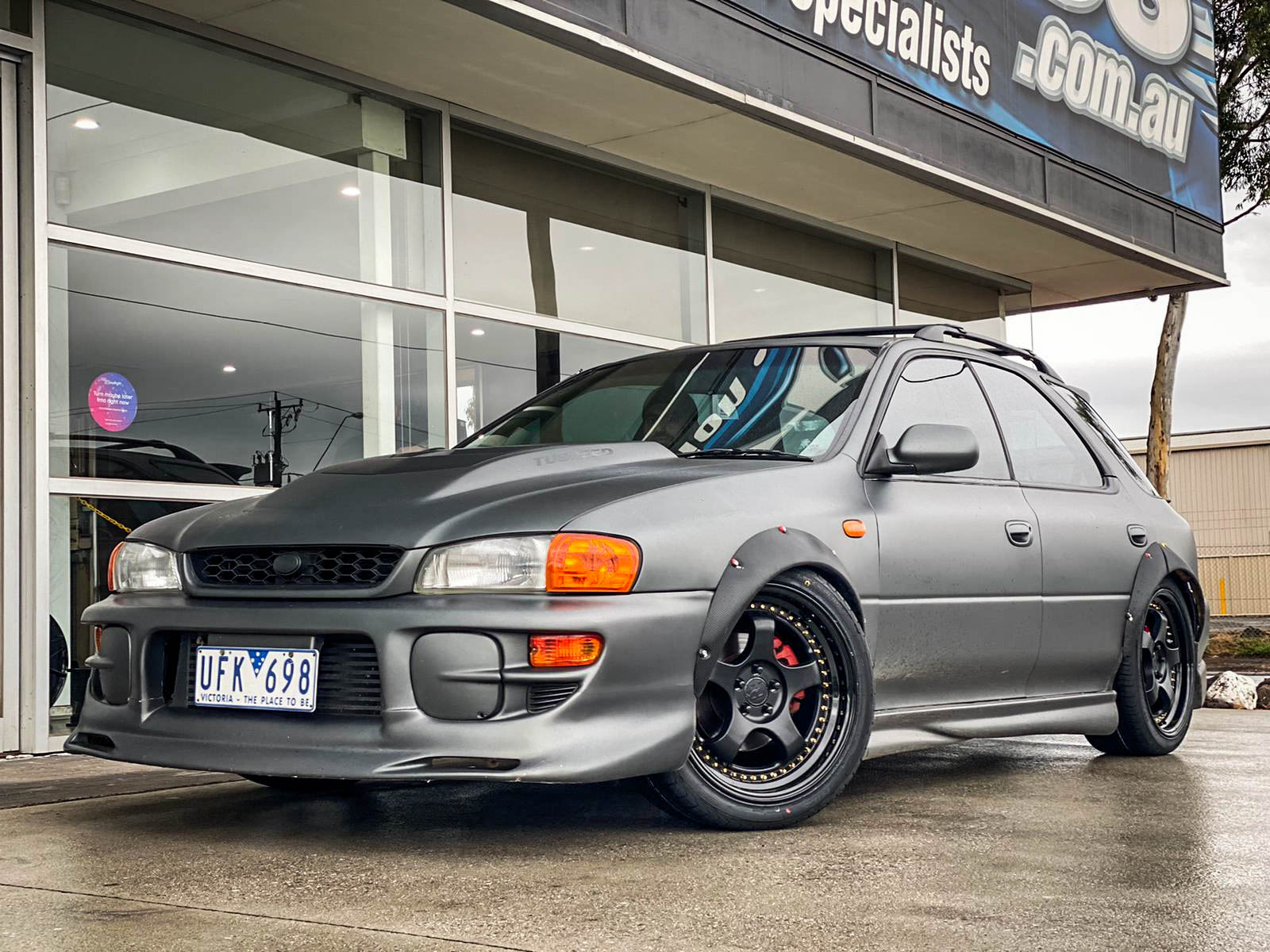 Subaru impreza hussla zen matte black gold rivets gloss black lip #3321