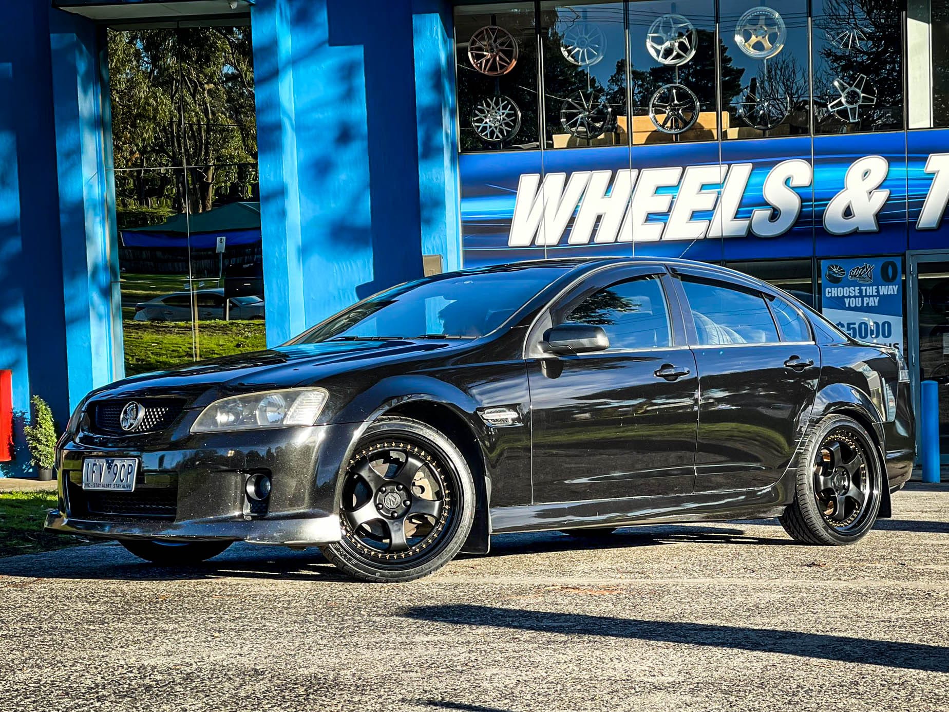 holden commodore hussla zen matte black gold rivets gloss black lip ...